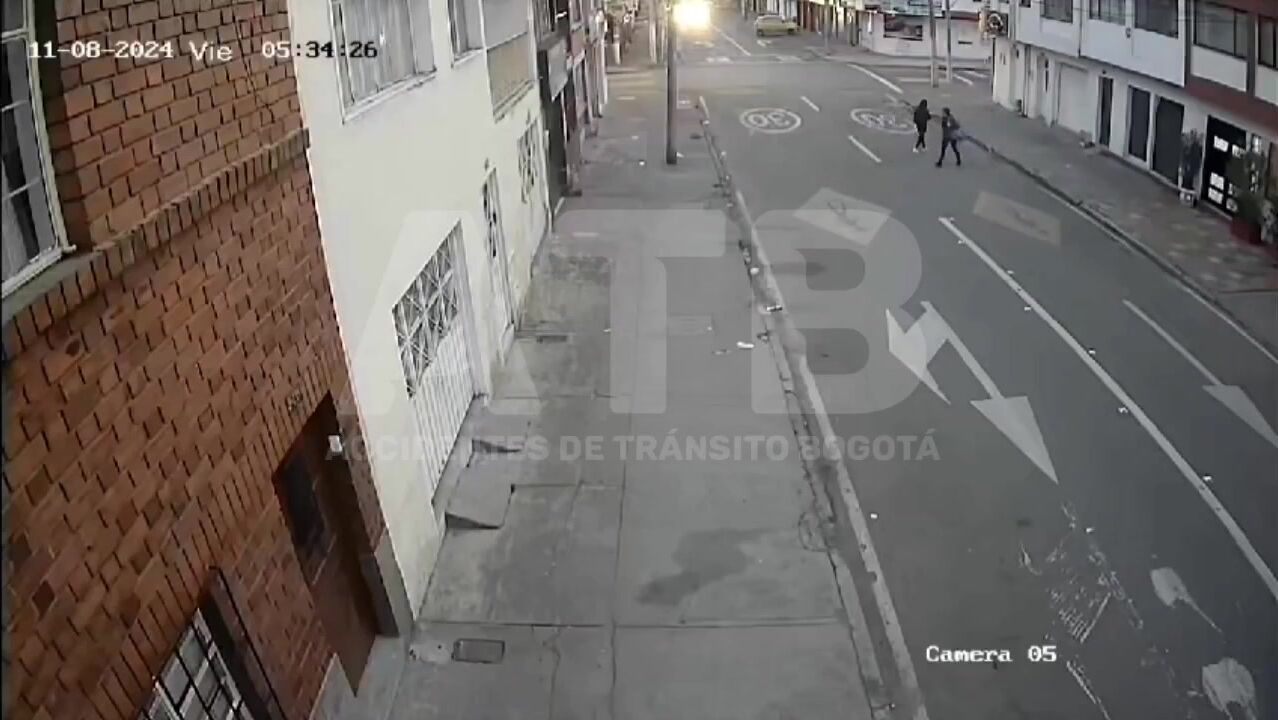 Car Ignores Stop Sign, Hits Bus In Colombia