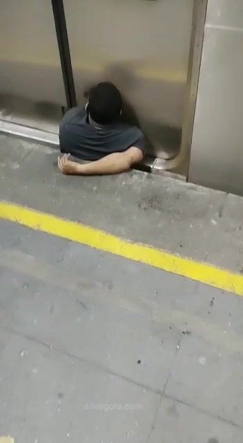 The Man Was Squeezed Between The Platform And The Train