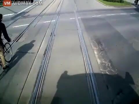 Cyclist Nearly Dies Trying To Overtake Tram