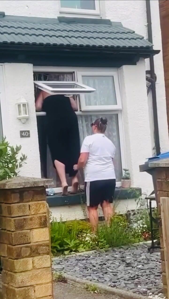 British Woman Trapped Outside Window